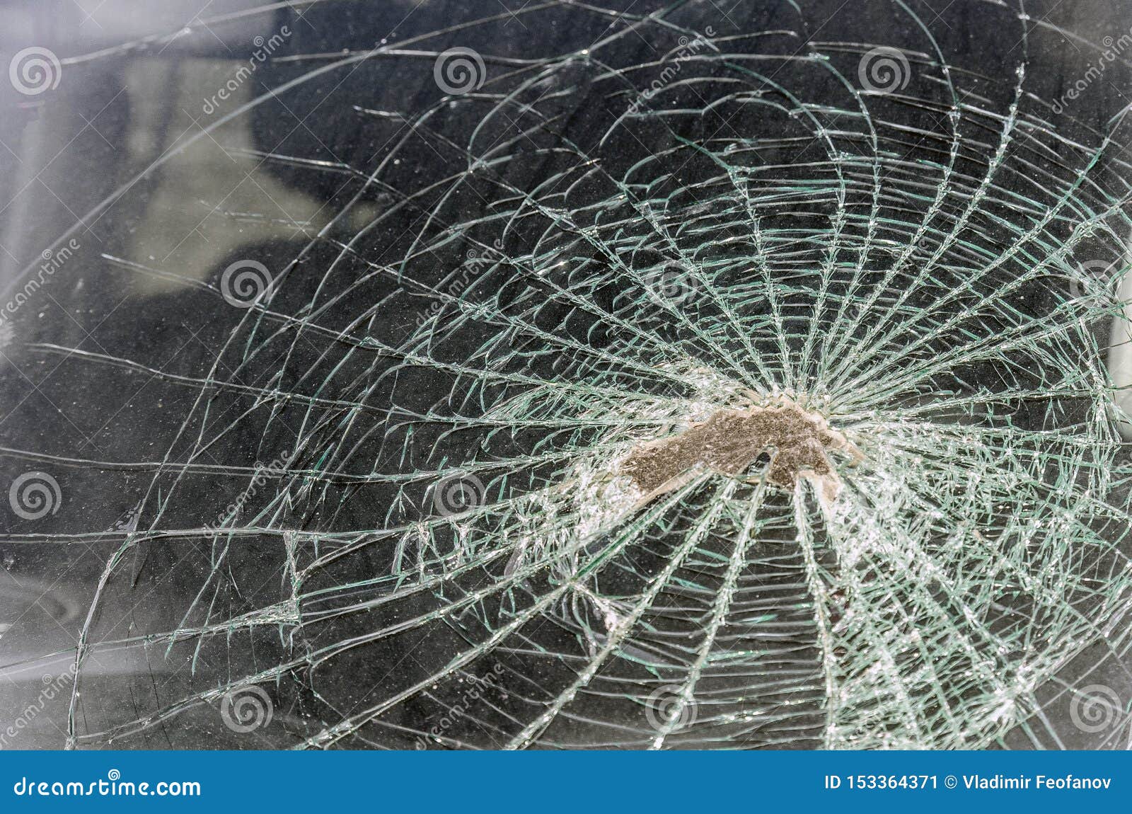 Stone or a Cobblestone Smashed the Windshield As it Flew into the Car ...