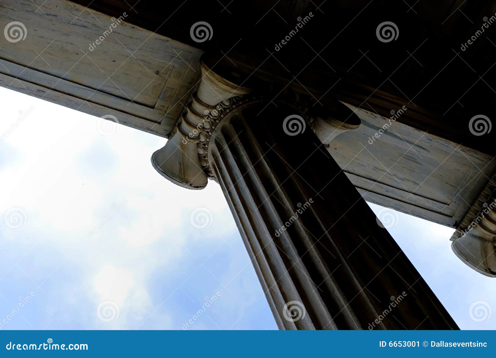 A Stone Column In The Ruins Of The City PompeiA Stone Column And Statue ...