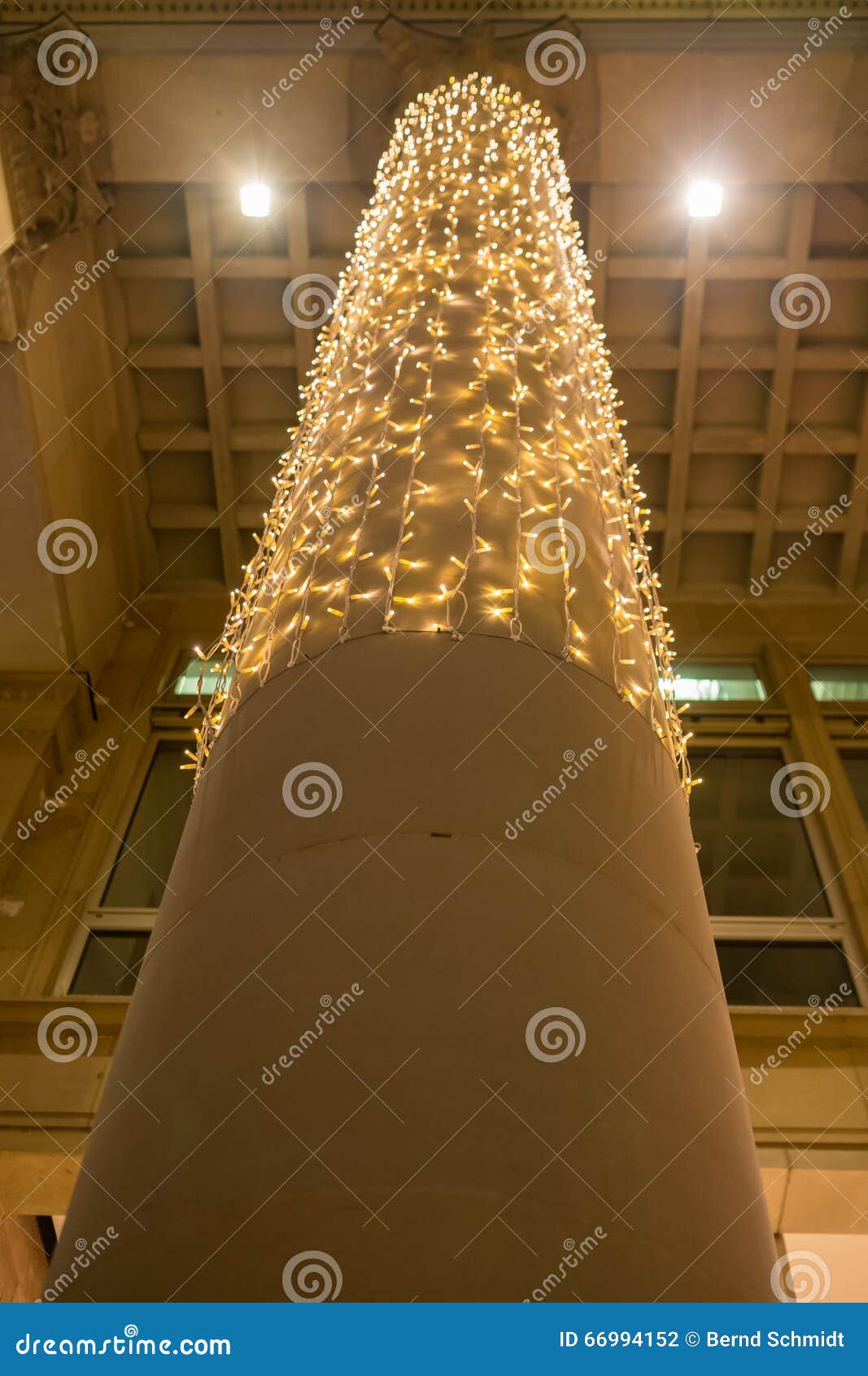 Stone Column with Fairy Lights and Headlights Stock Photo - Image of ...