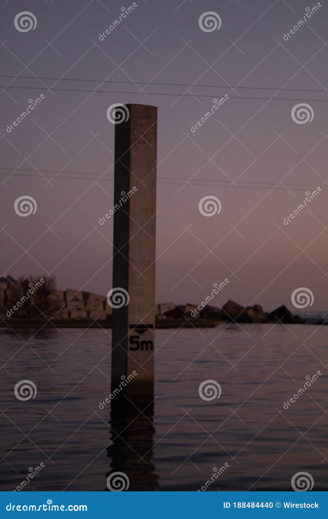 Stone Column in the Sea for Measuring the Sea Level Stock Photo - Image ...