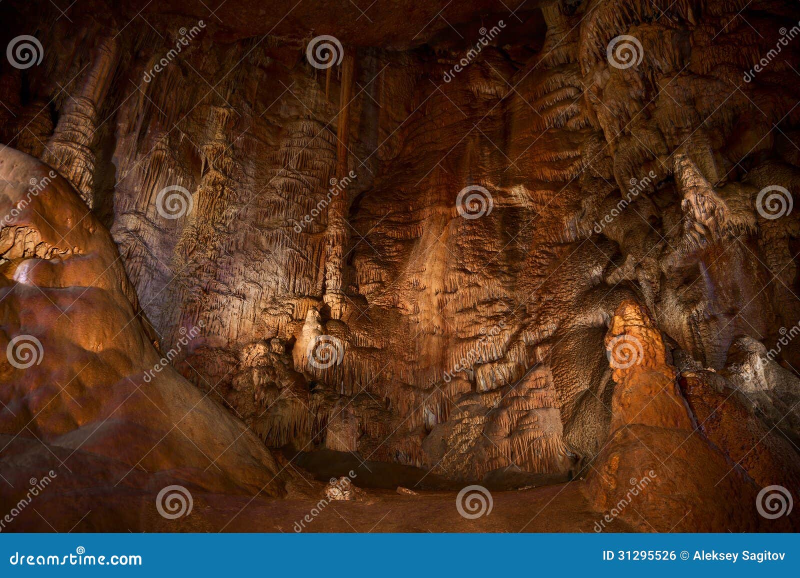 Stone columns in a cave stock photo. Image of column - 31295526