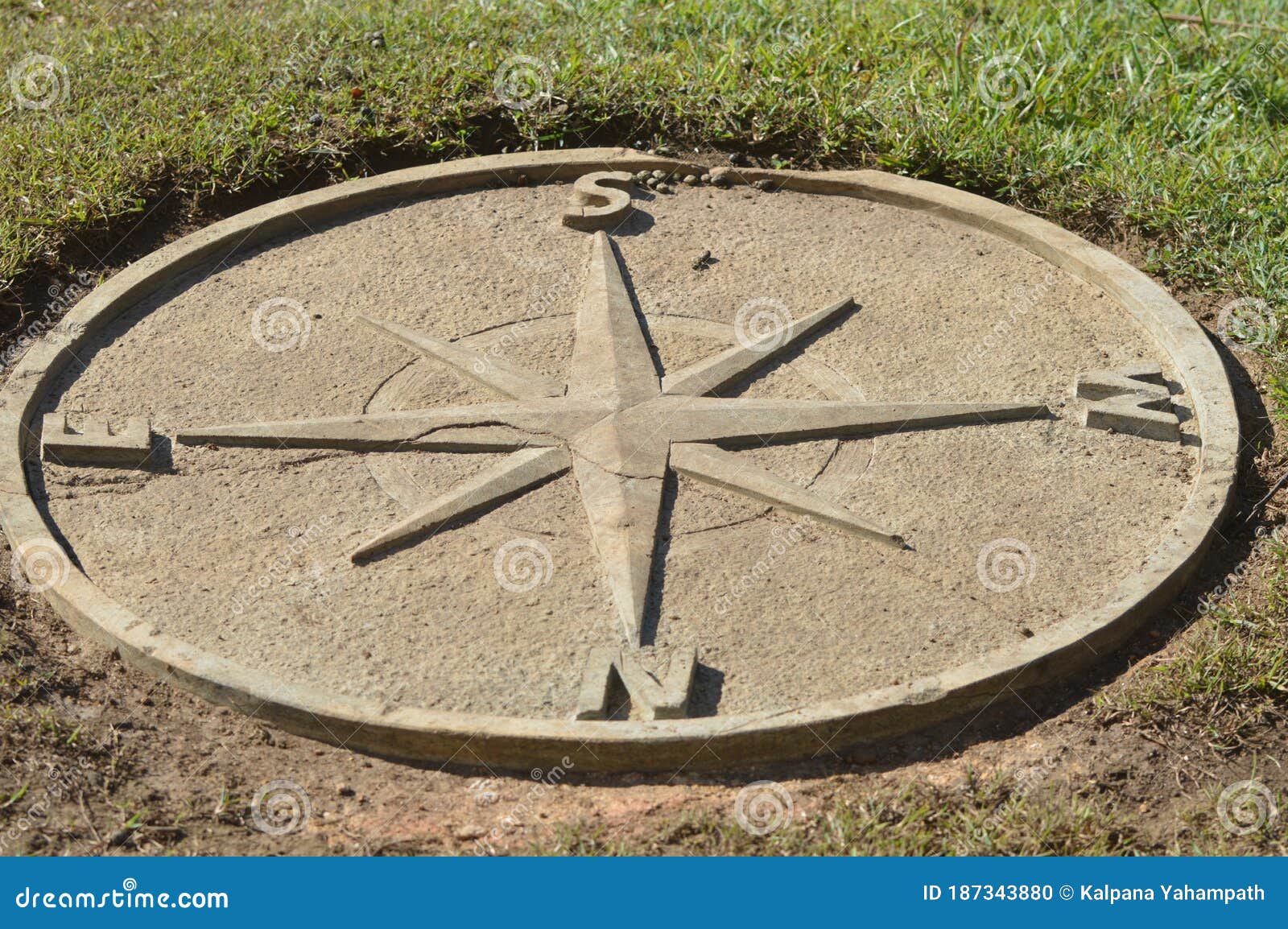 Stone Compass Rose Set Within A Star. Golden Coloured Paving Slabs ...