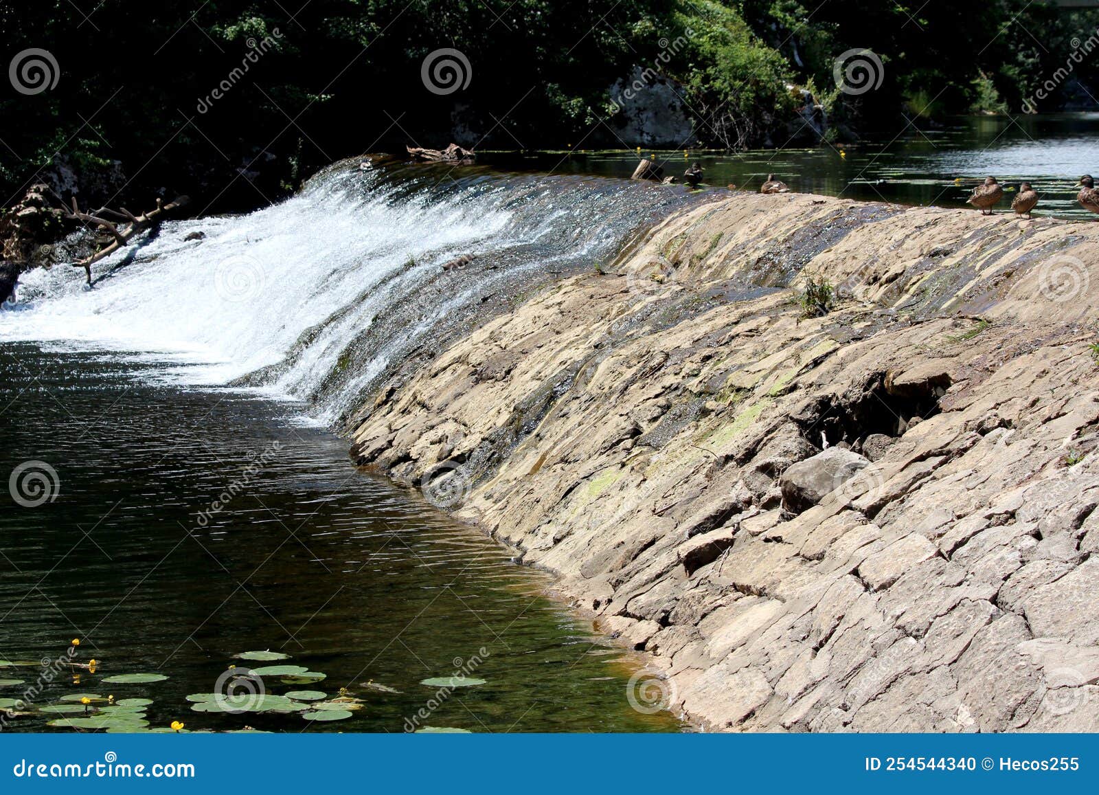 Stone and Concrete Old River Dam with Big Hole in the Middle of Dry ...