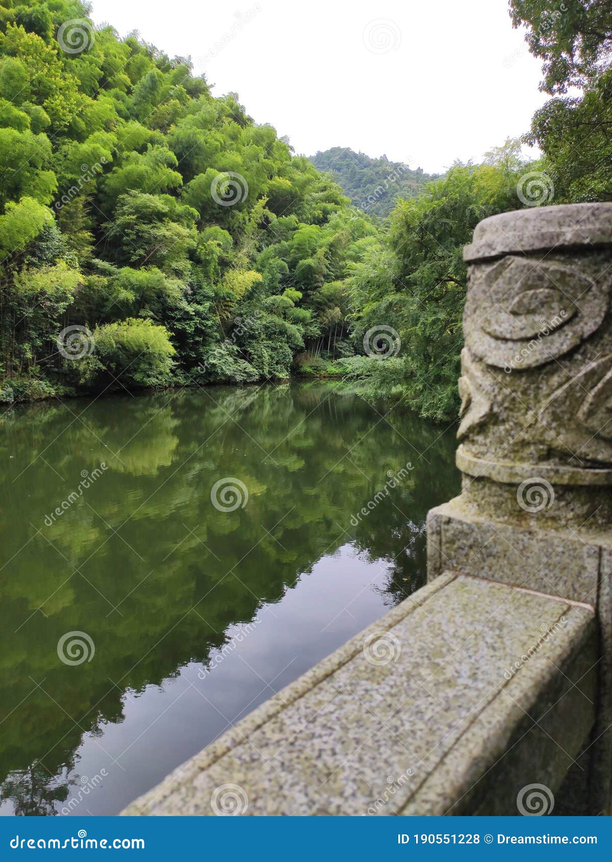 Stone corridor by the lake editorial stock photo. Image of ...