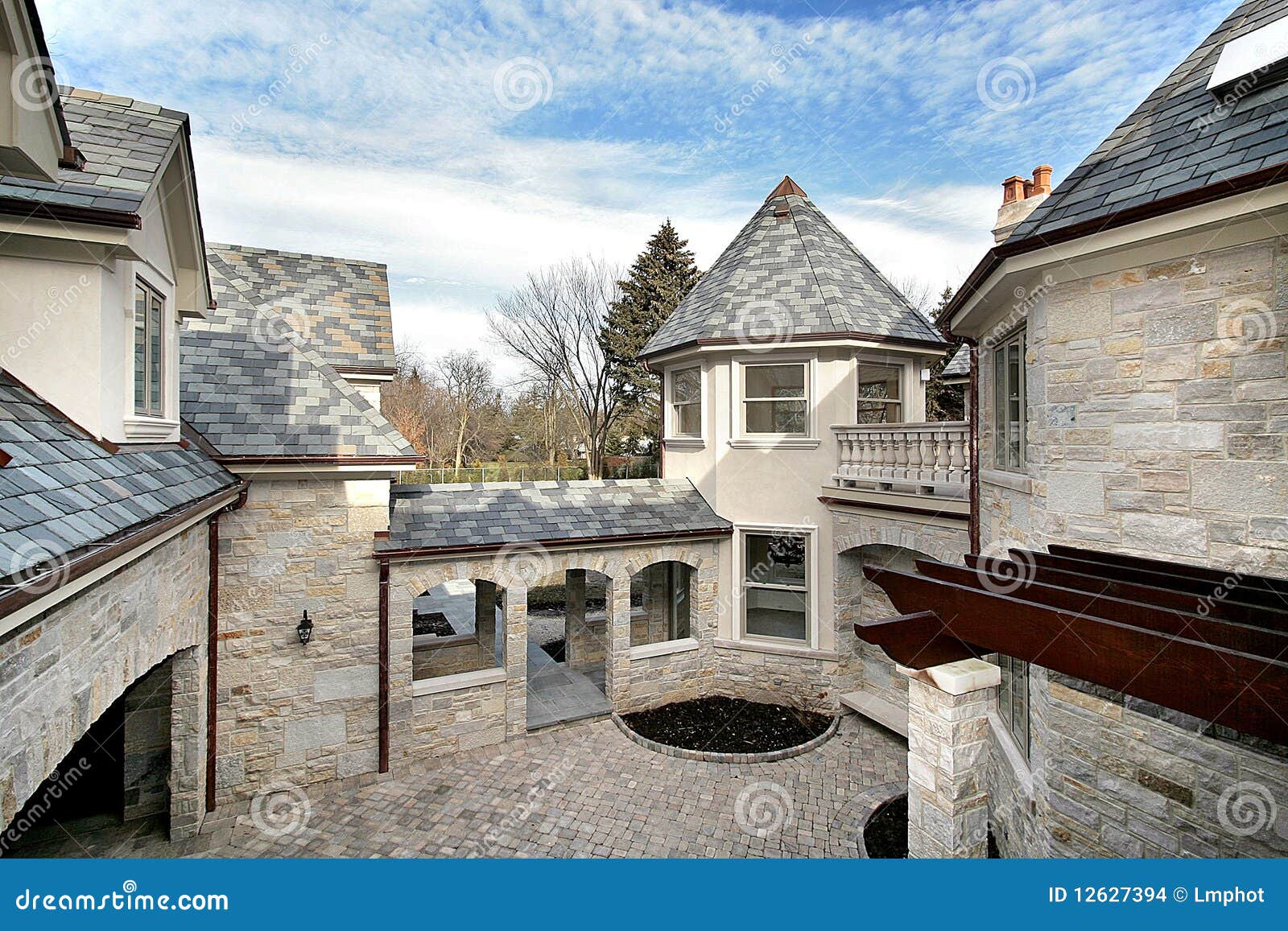 Stone courtyard and turret stock photo. Image of modern - 12627394