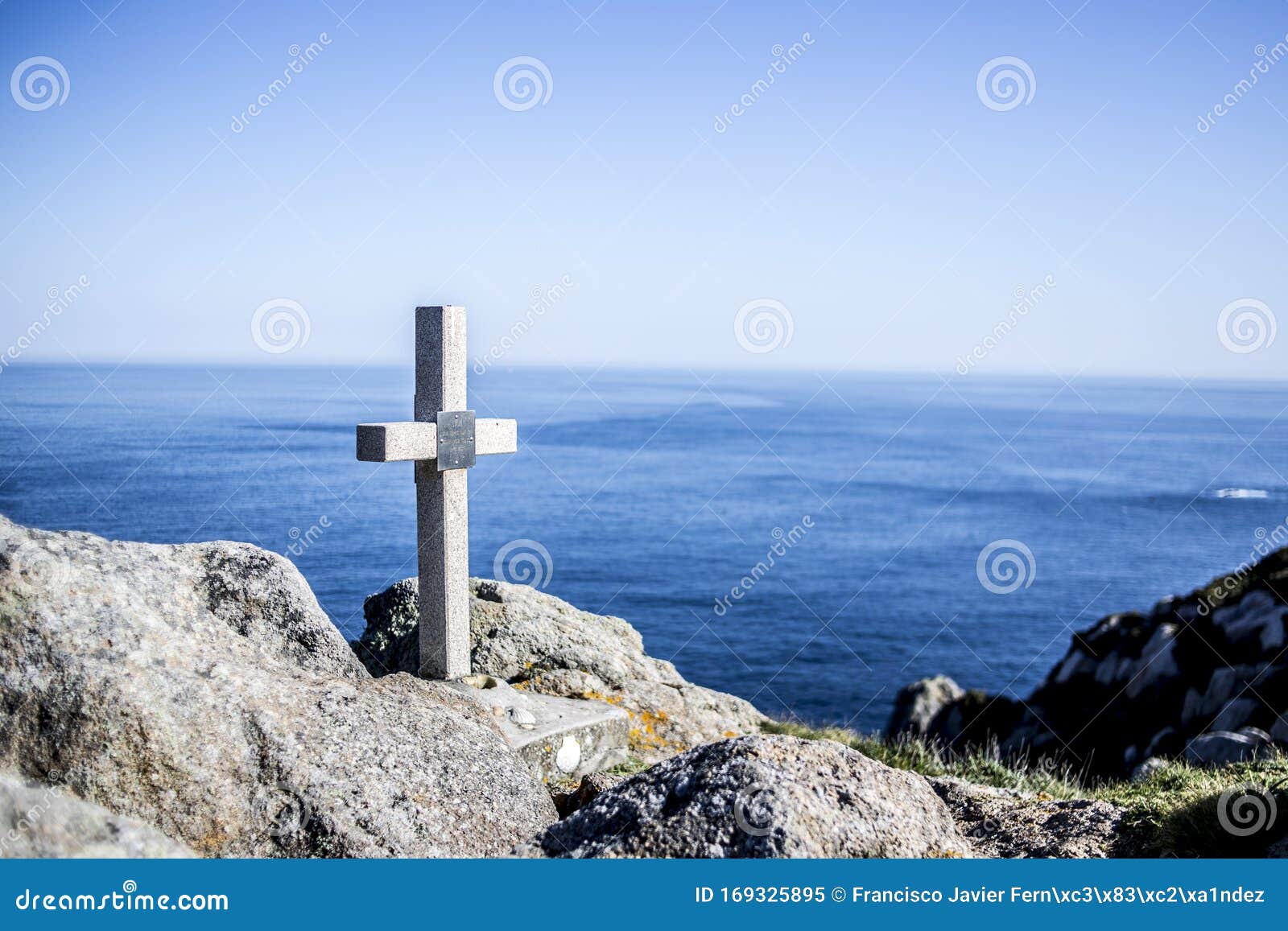 Stone Cross on the Edge of a Cliff Overlooking the Ocean Stock Image ...