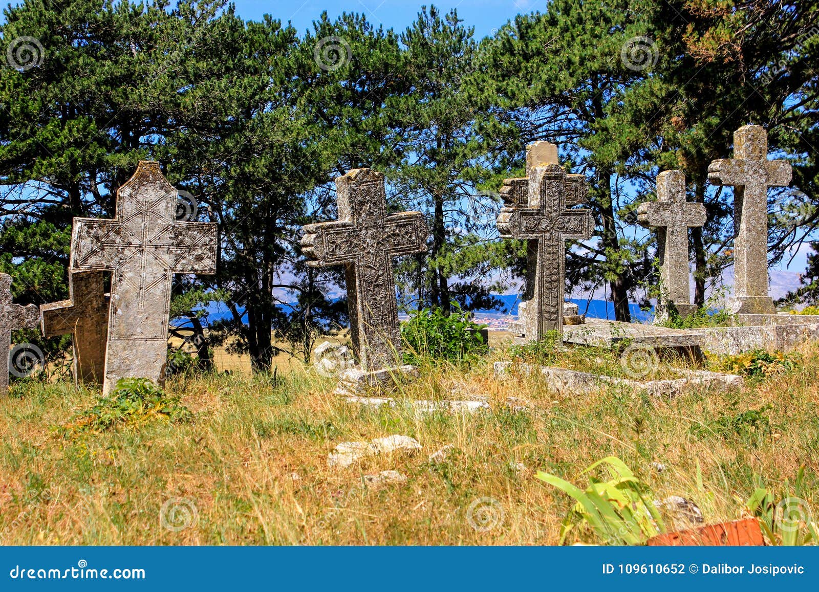 Stone crosses on graveyard stock photo. Image of nature - 109610652