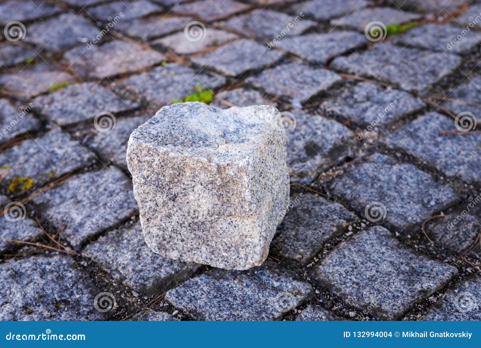 Stone Cube on Paving Stone Surface of Walkway in Europe Stock Photo ...