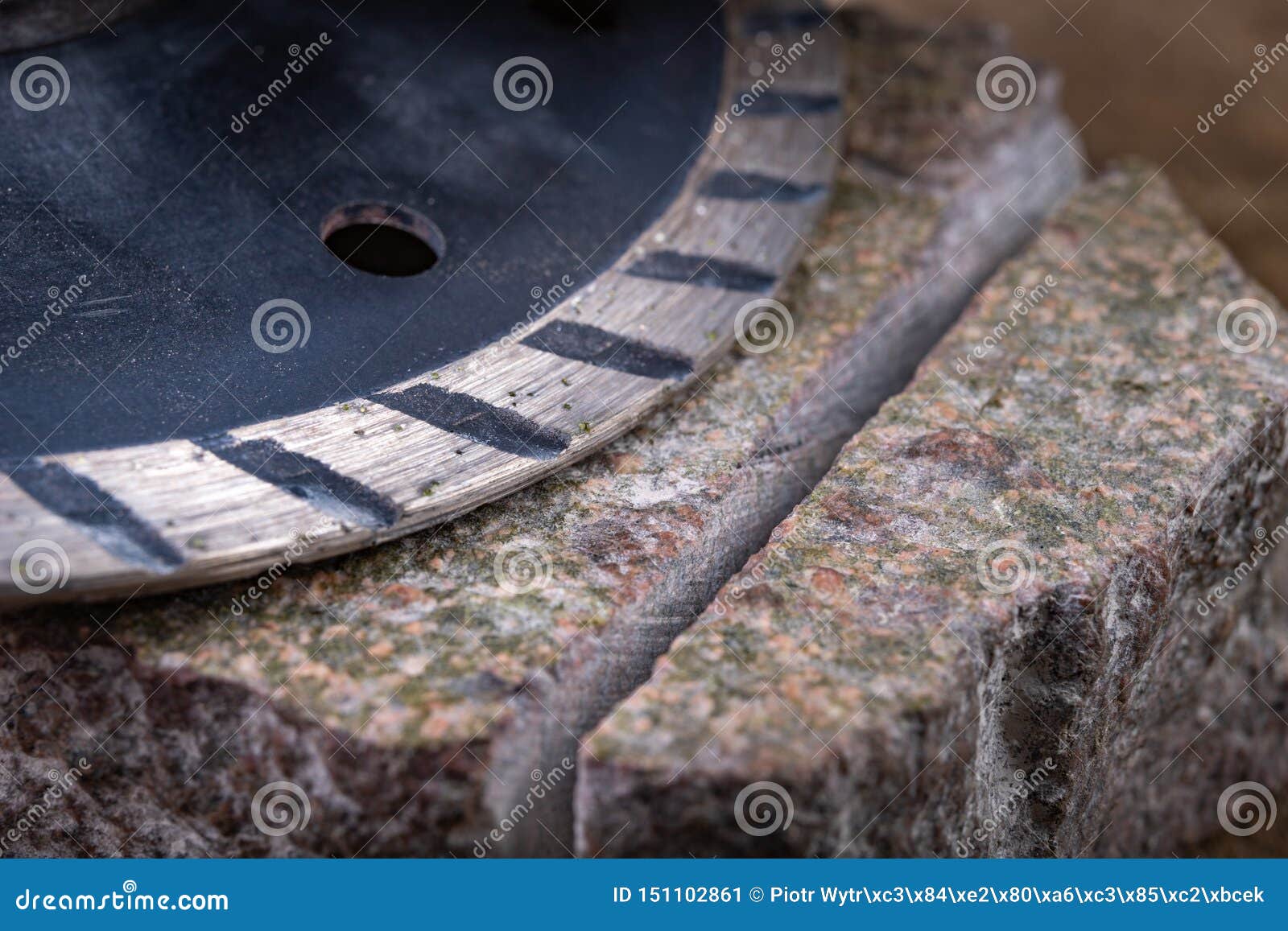 Stone Cutting with a Diamond Disc Mounted in a Grinder. Work in a Stone ...