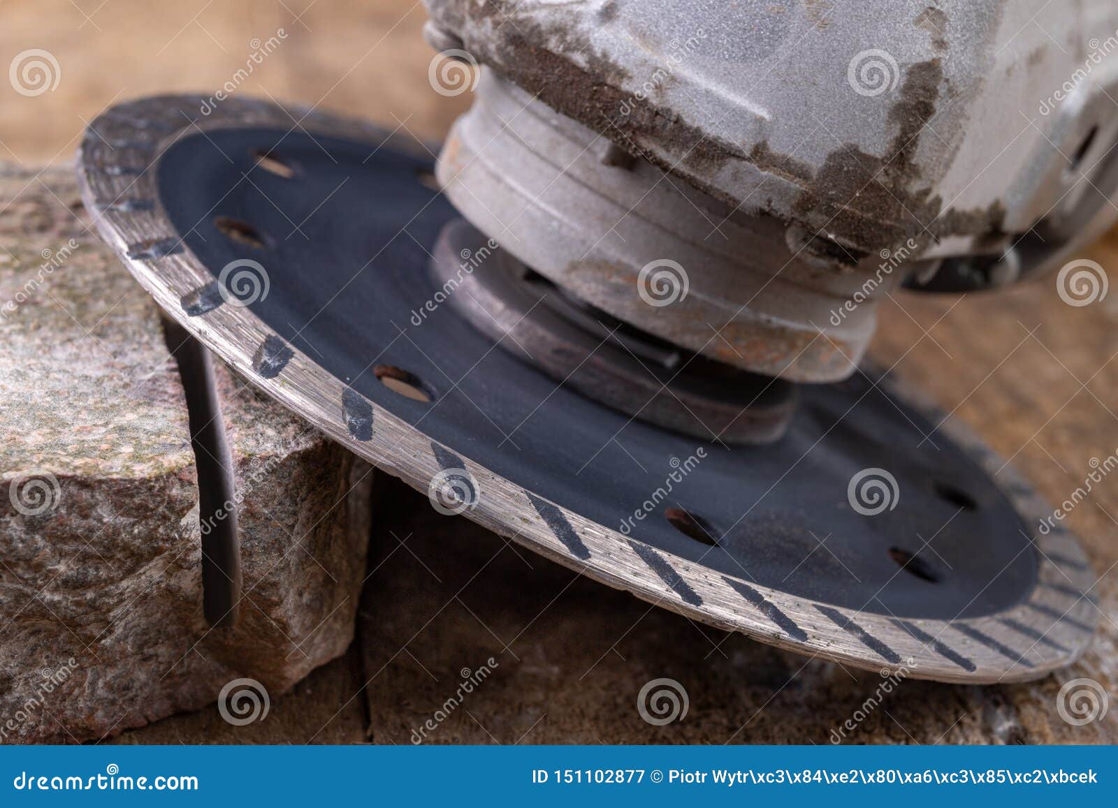 Stone Cutting with a Diamond Disc Mounted in a Grinder. Work in a Stone ...