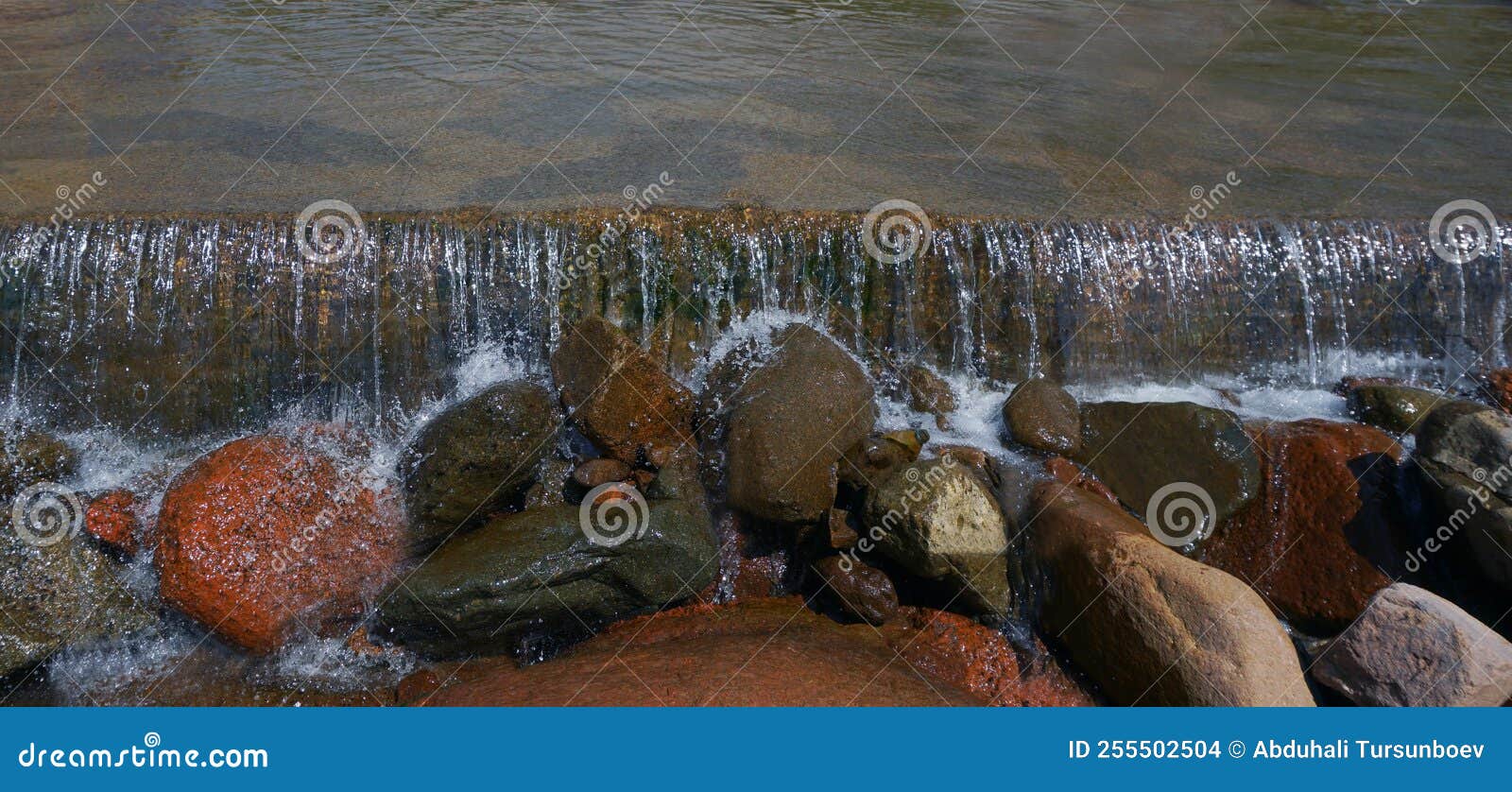 A Stone Dam on the Water S Edge Stock Photo - Image of rock, lake ...
