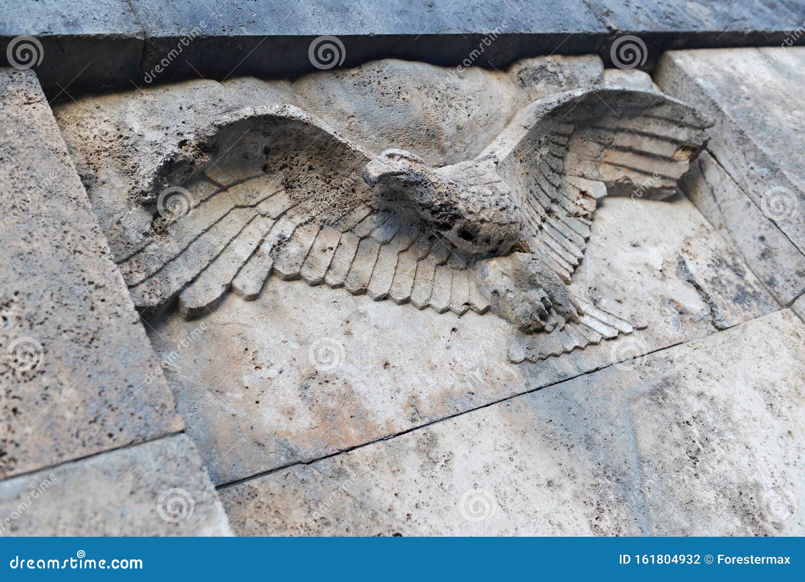 Stone eagle bas-relief stock photo. Image of relief - 161804932