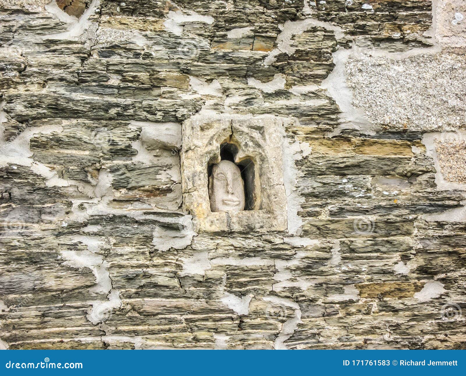 Stone Face in Old Wall, Padstow, Cornwall, England, UK Stock Image ...