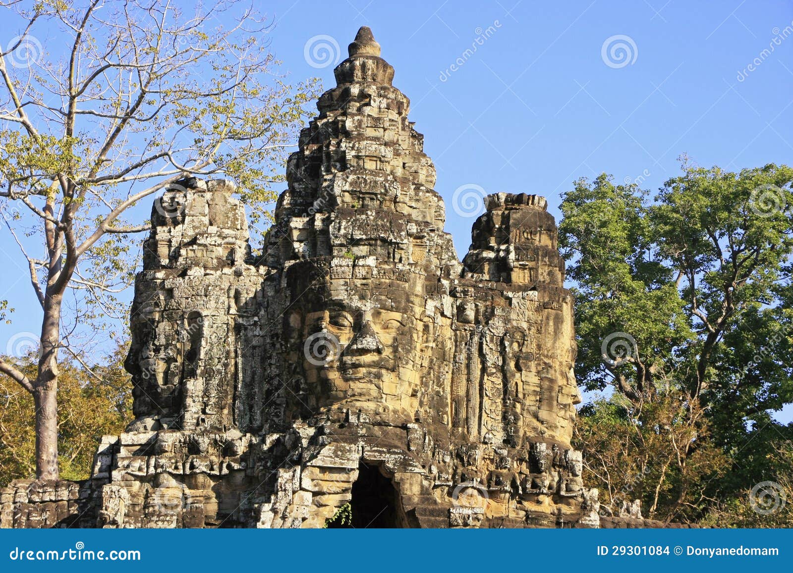 Stone Faces of South Gate, Angkor Thom Stock Photo - Image of bayon ...