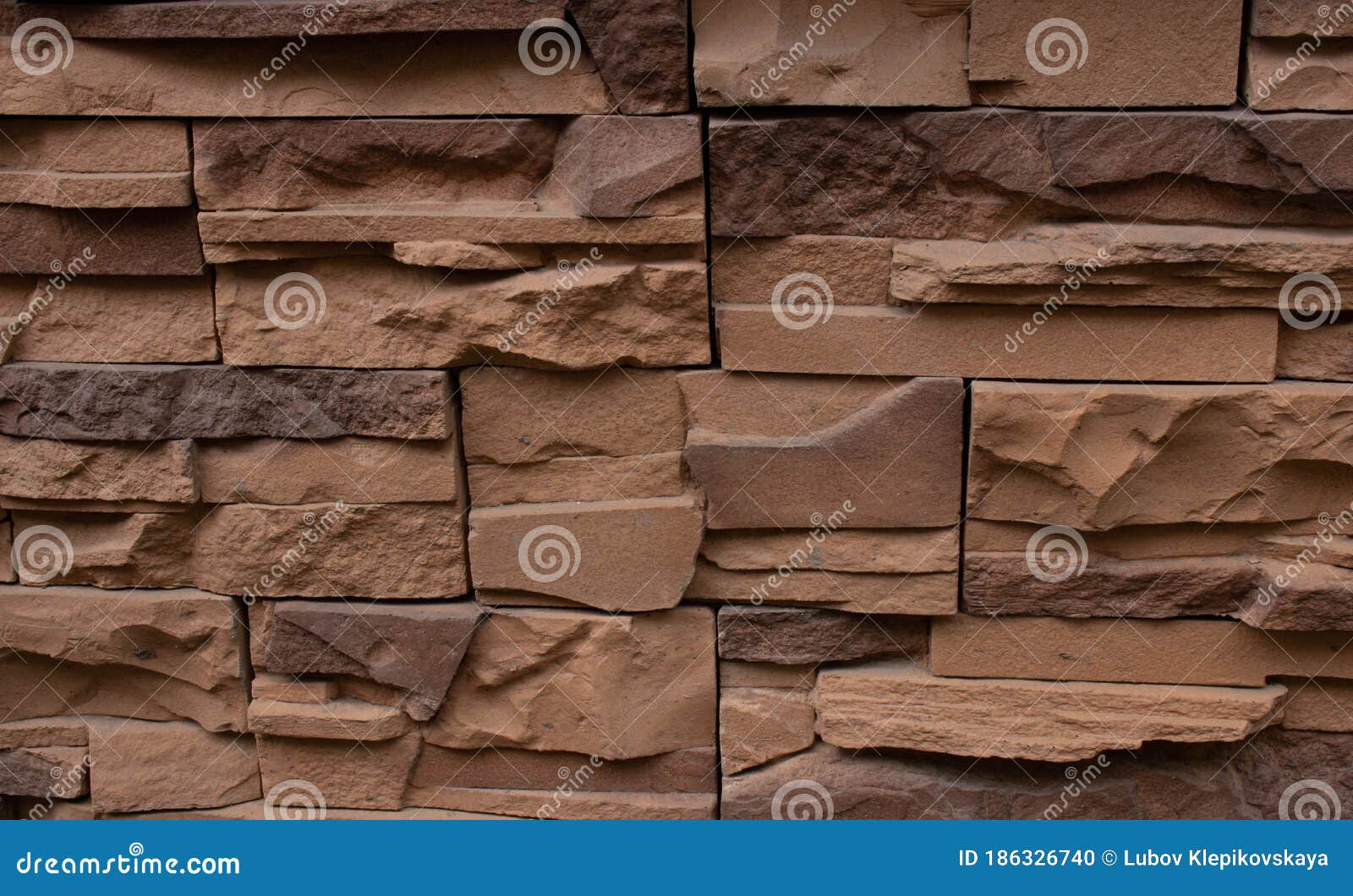 Stone Facing of Facades and Walls.the Wall is Made of Decorative Facing ...