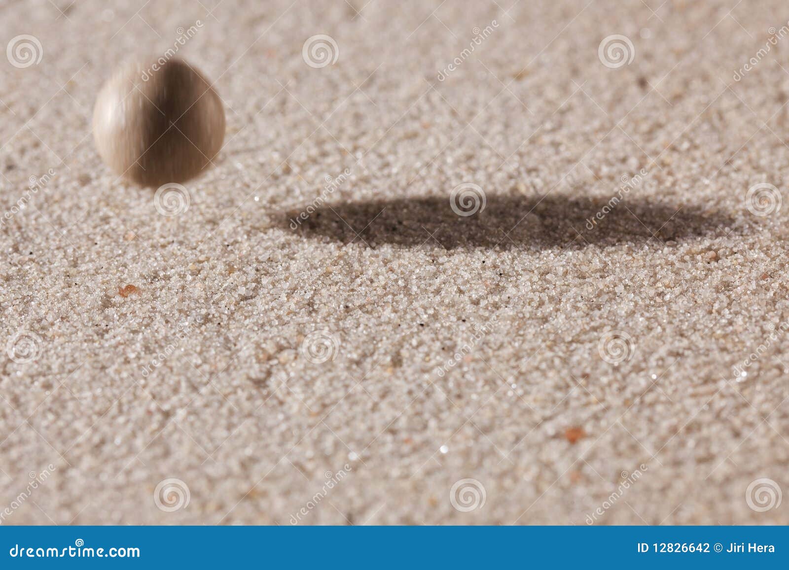 Stone falling down in sand stock photo. Image of meditation - 12826642