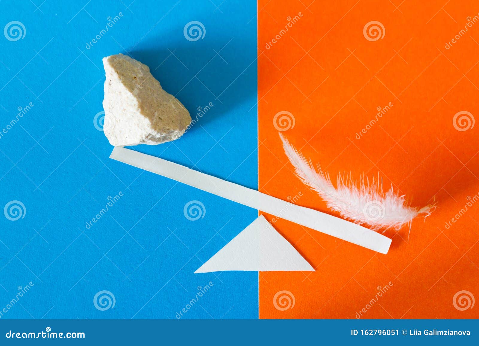 Stone and feather stock image. Image of force, stone - 162796051
