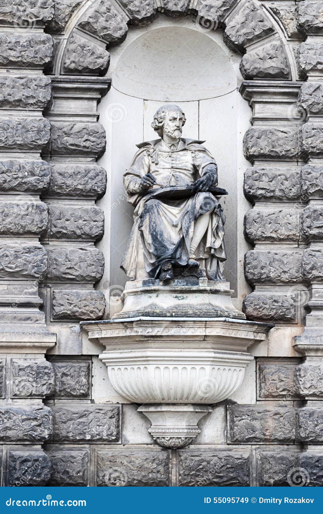 Stone figure on a wall stock image. Image of stone, city - 55095749