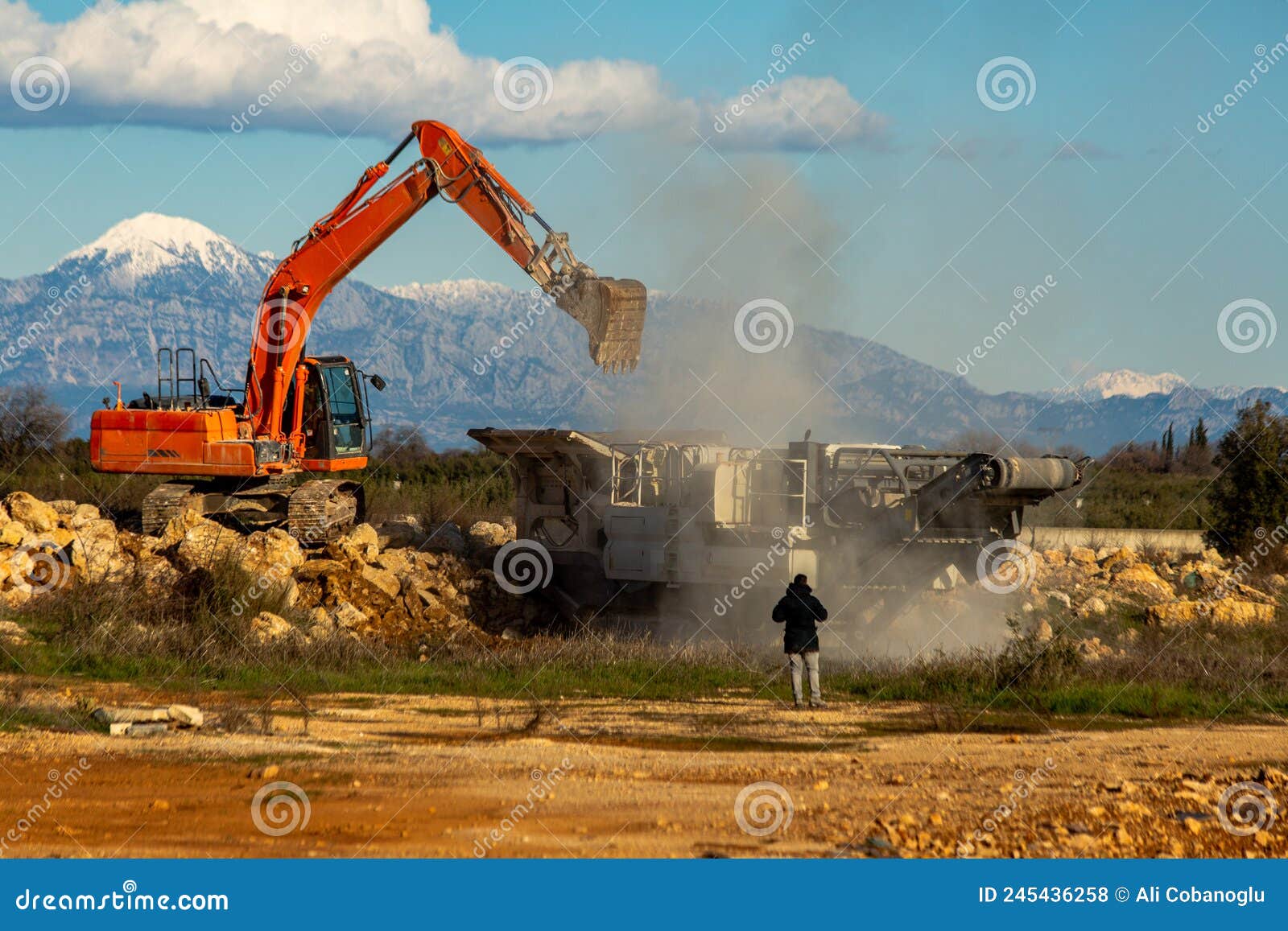 Stone Filled Rock Crusher with Stone Crusher and Bucket Editorial Stock ...