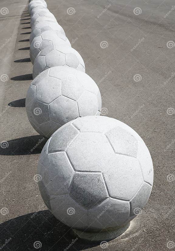 Stone footballs stock photo. Image of architectural, balls - 5260444