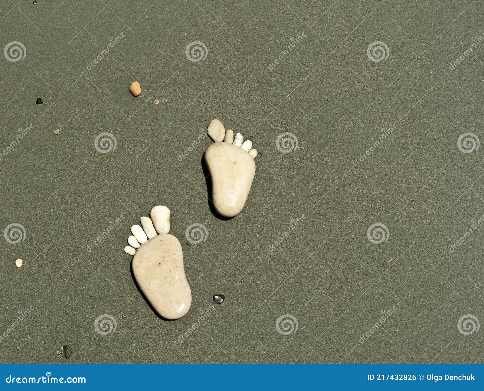 Stone Footprints on Beach Sand Stock Photo - Image of pebble, stone ...
