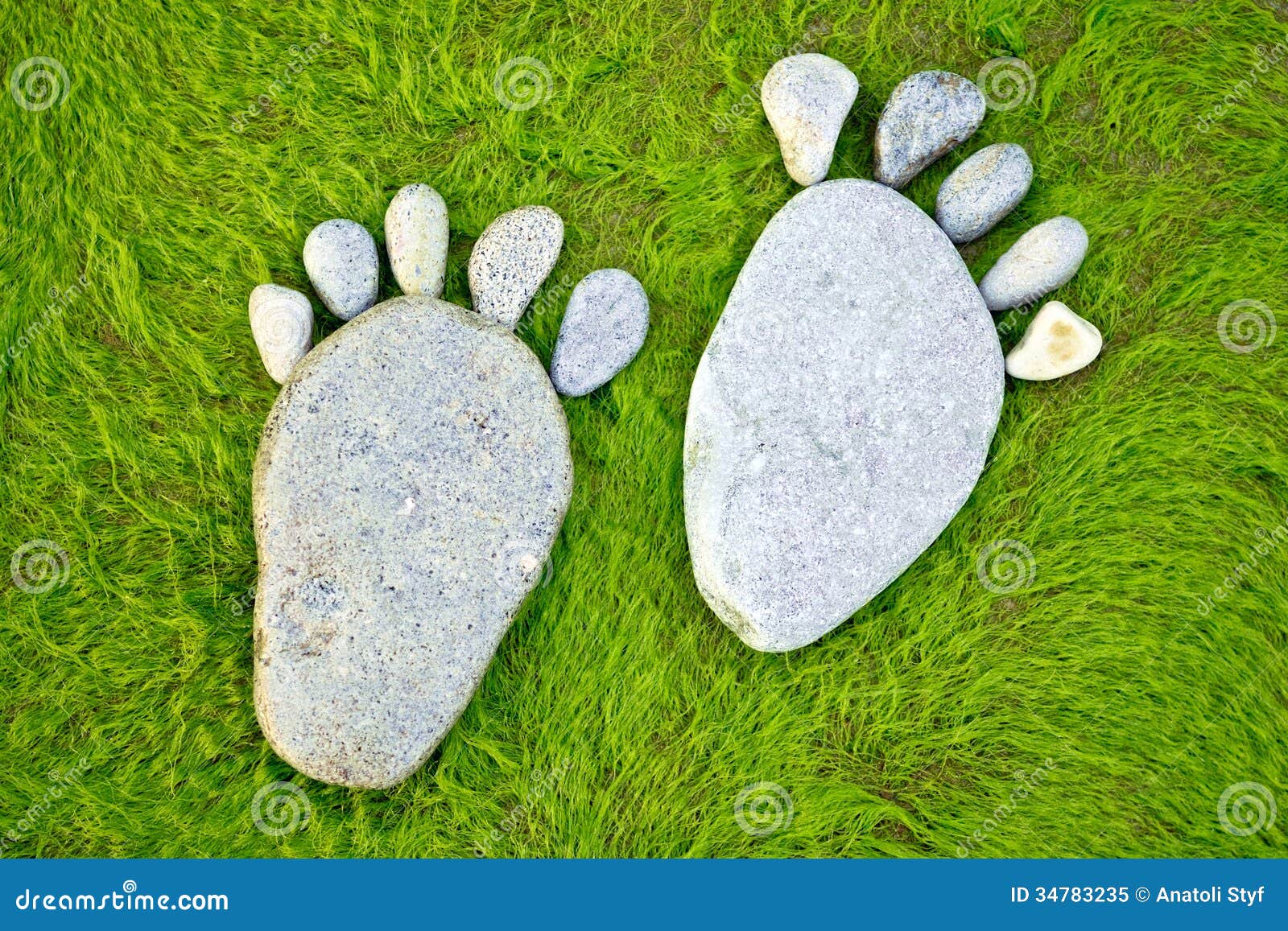 Stone footprints stock image. Image of green, coast, barefoot - 34783235