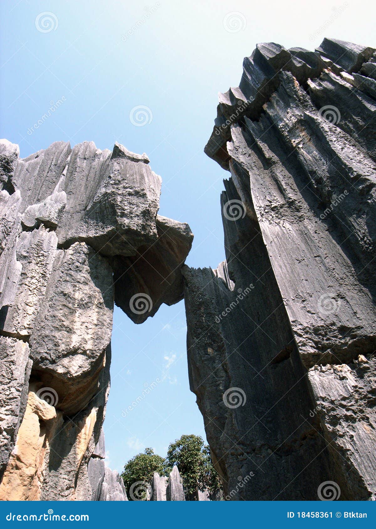 Stone forest stock image. Image of kunming, clouds, evolution - 18458361