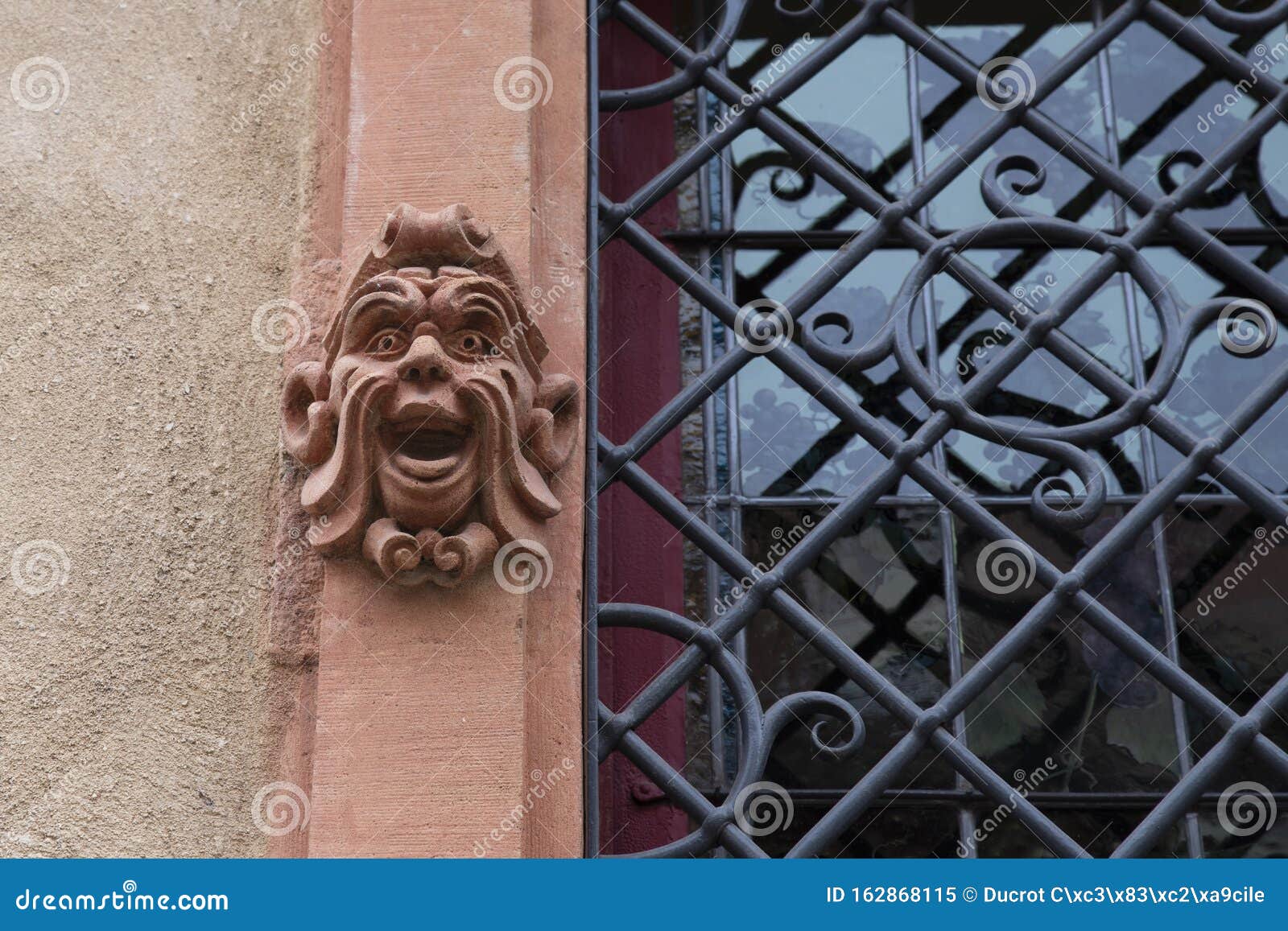 Stone gargoyle on a house stock image. Image of france - 162868115