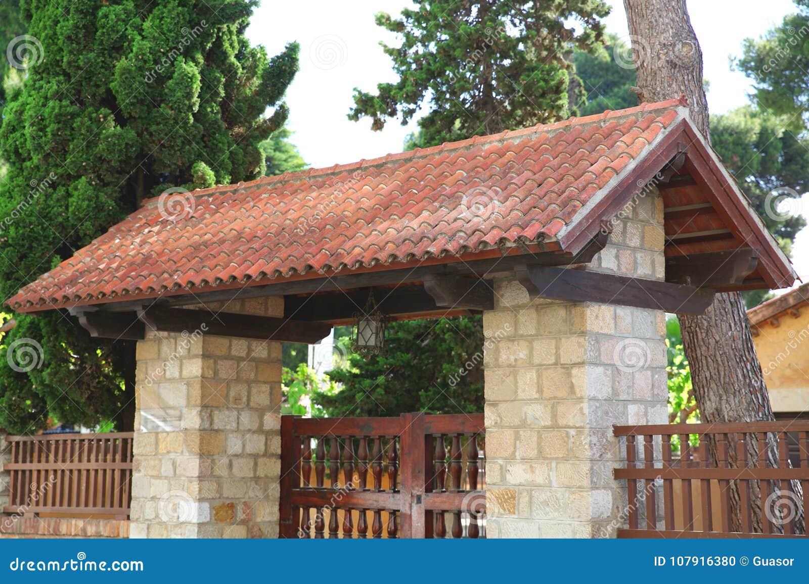 Stone Gate and the Tiles on Roof, Decorated Facade Stock Photo - Image ...