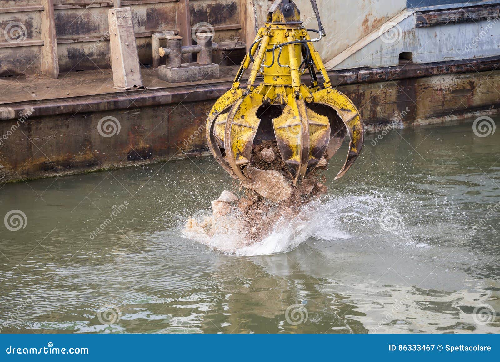Stone grapple in action stock image. Image of rock, gravel - 86333467