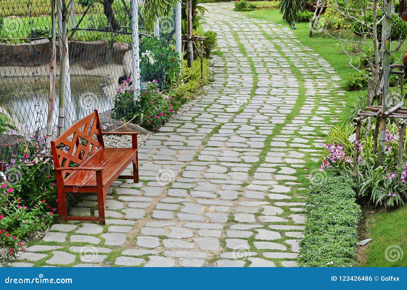 Stone and Grass Pathway in the Garden Stock Photo - Image of house ...