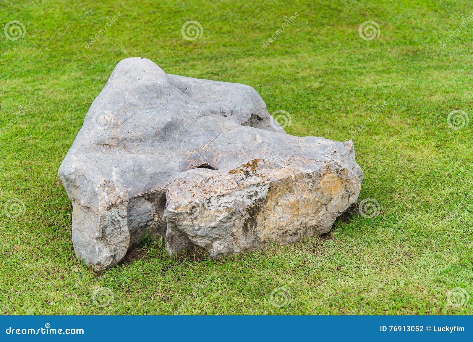 Stone on Green Grass in the Garden Stock Photo - Image of large, white ...