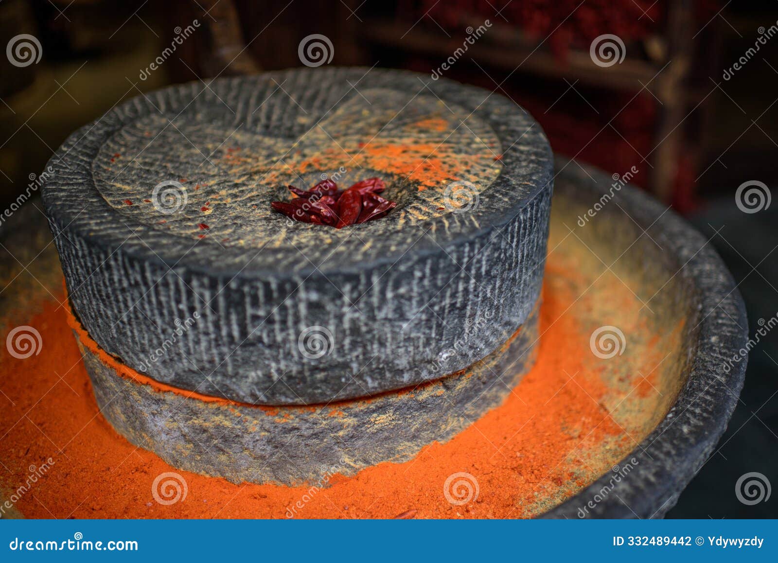 Stone grinding pepper stock photo. Image of mill, grinding - 332489442