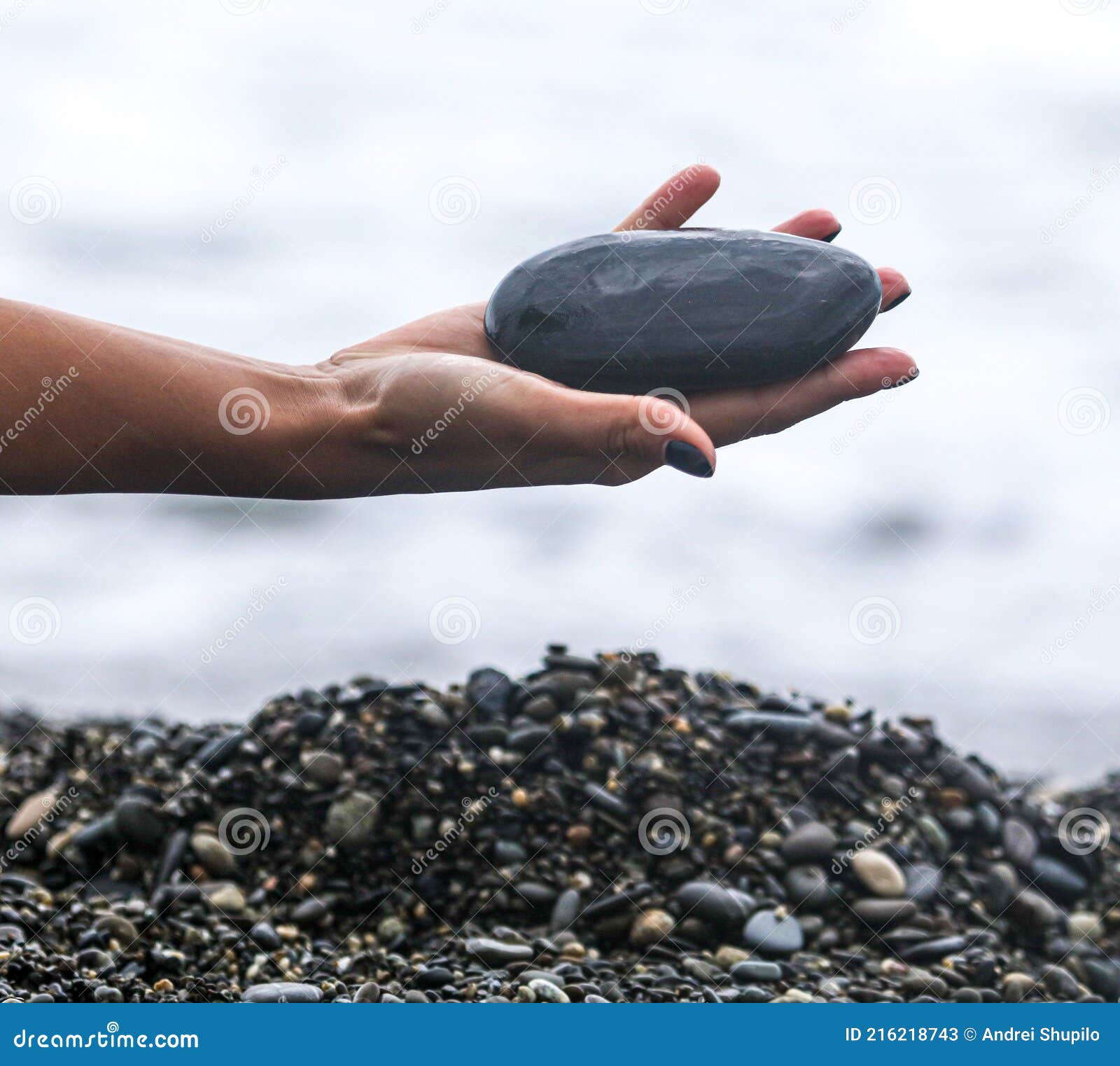 Stone in the Hand of a Girl Stock Image - Image of water, human: 216218743