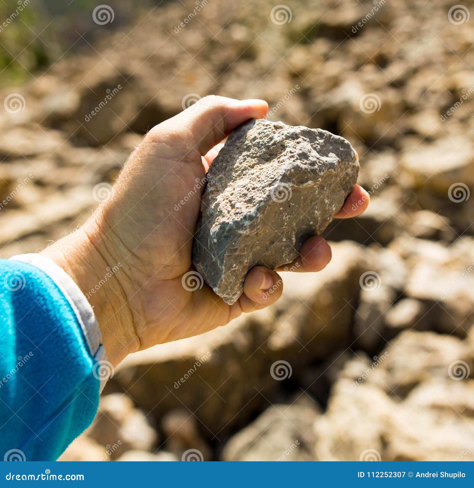 Stone in Hand in the Mountains Stock Image - Image of sport, nature ...