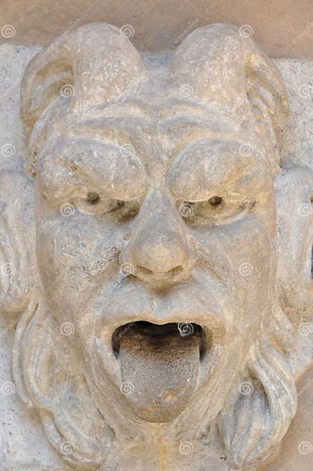 Stone head gargoyle stock image. Image of artistic, historic - 42932395