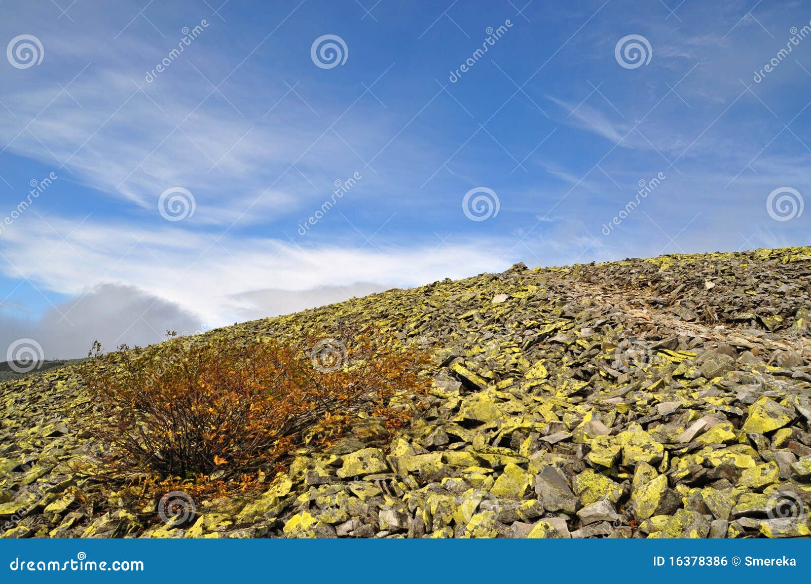 Stone hillside. stock photo. Image of clouds, stone, hillside - 16378386