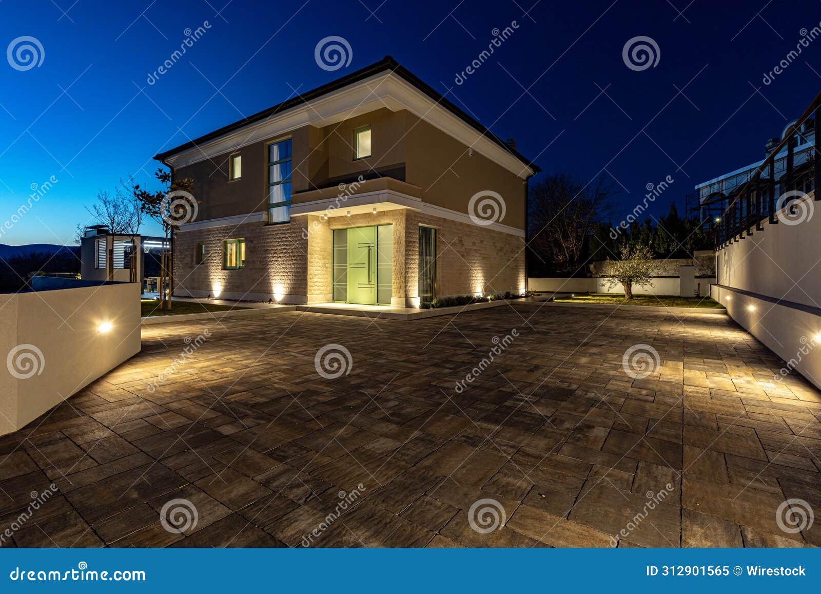 Stone House and Driveway Lit Up at Night Editorial Image - Image of ...