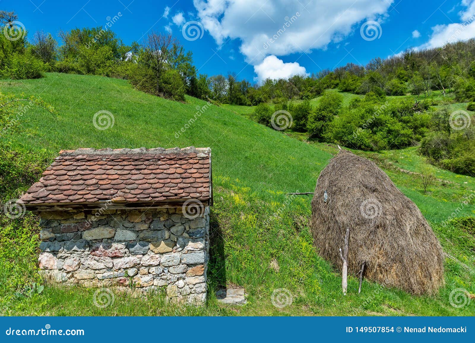 A Stone House and a Haystack in Nature Stock Photo - Image of reserve ...