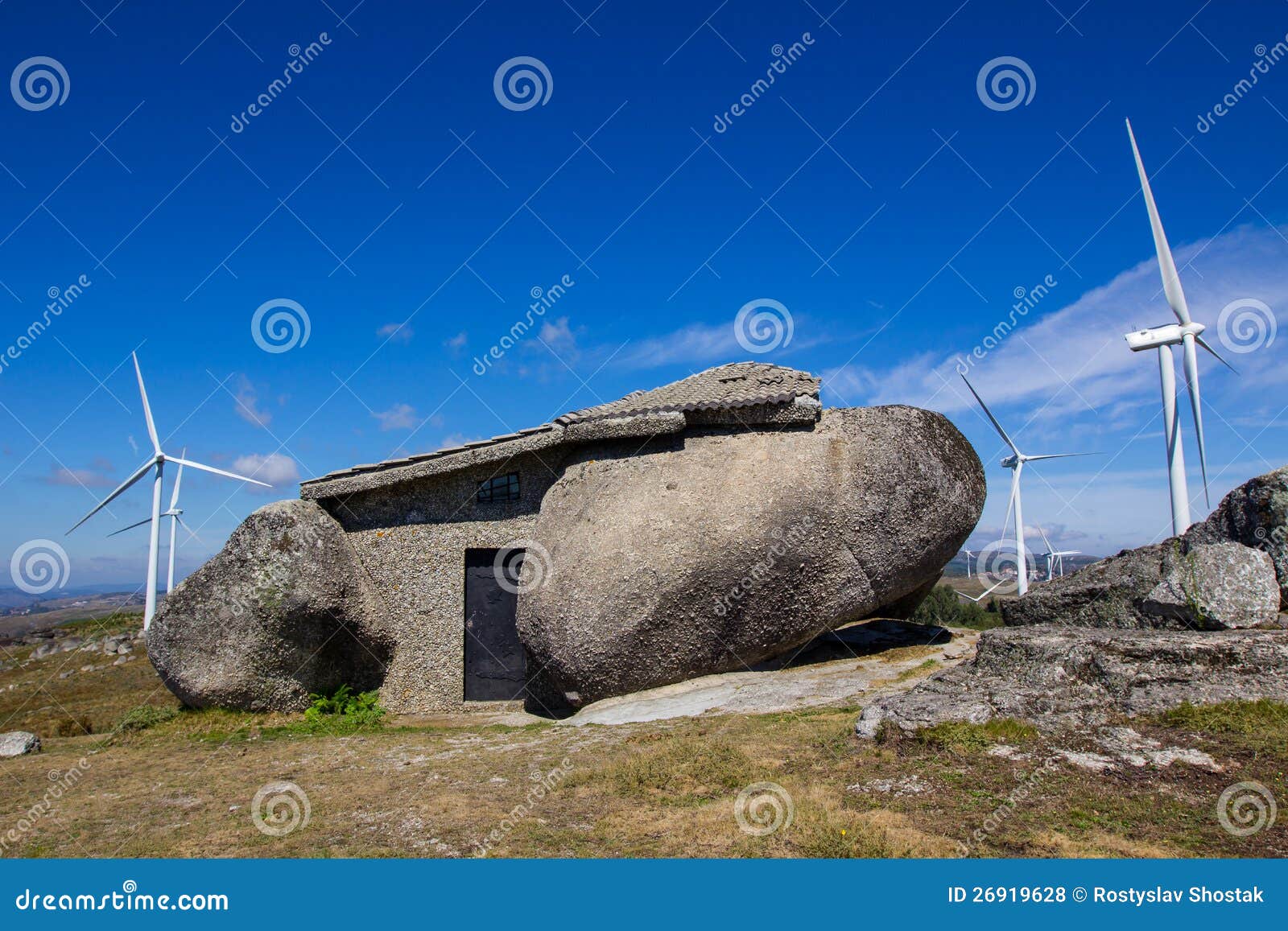Stone House, Wind Turbine, Blue Sky Stock Photo - Image of stone, tall ...