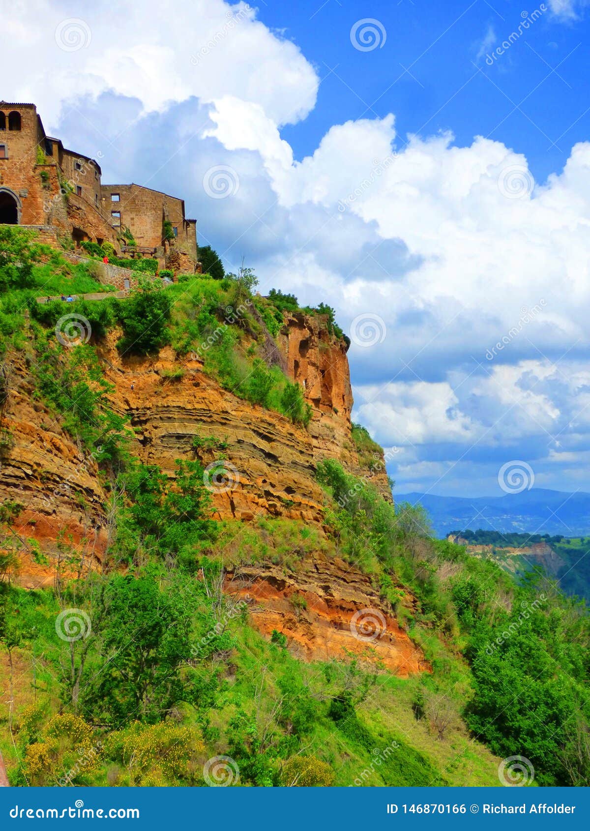 Stone Houses Built on a Eroding Cliff Stock Photo - Image of scenic ...