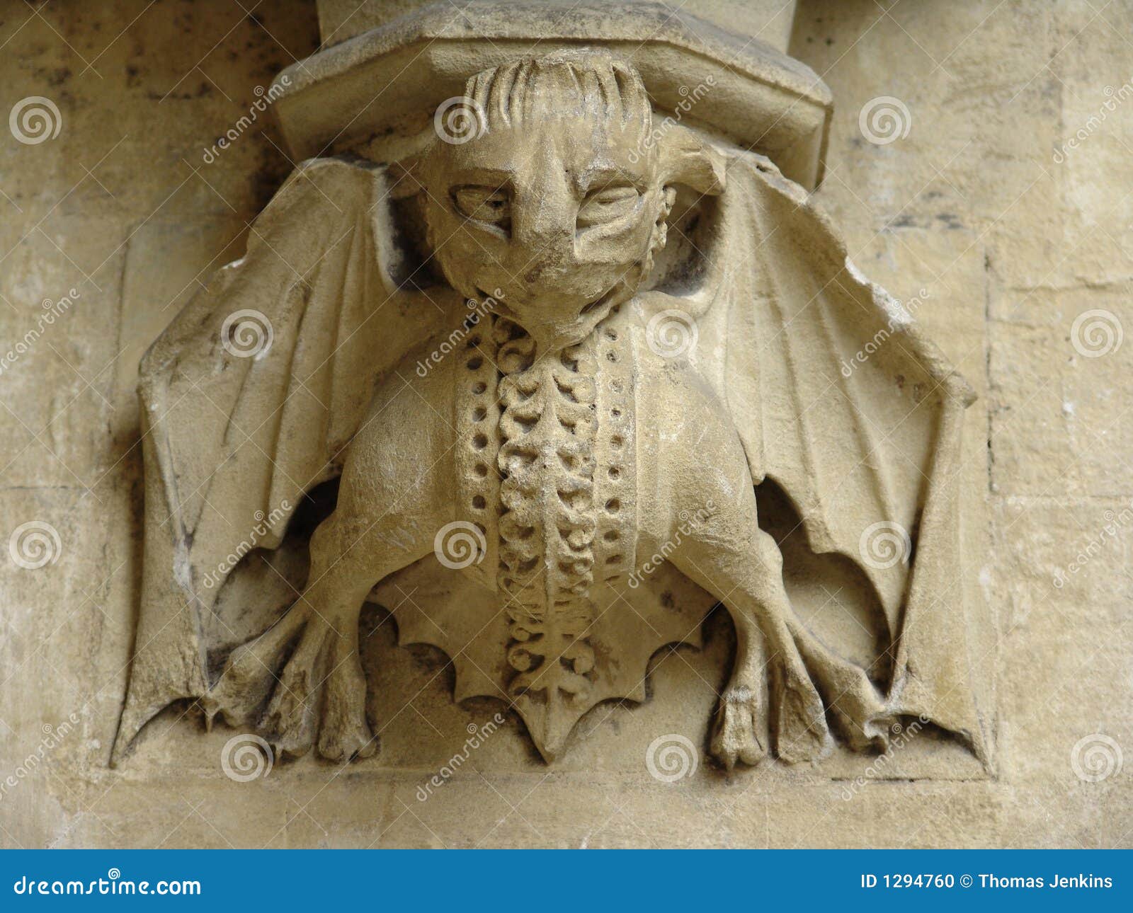 Stone imp carving on wall stock photo. Image of gargoyle - 1294760
