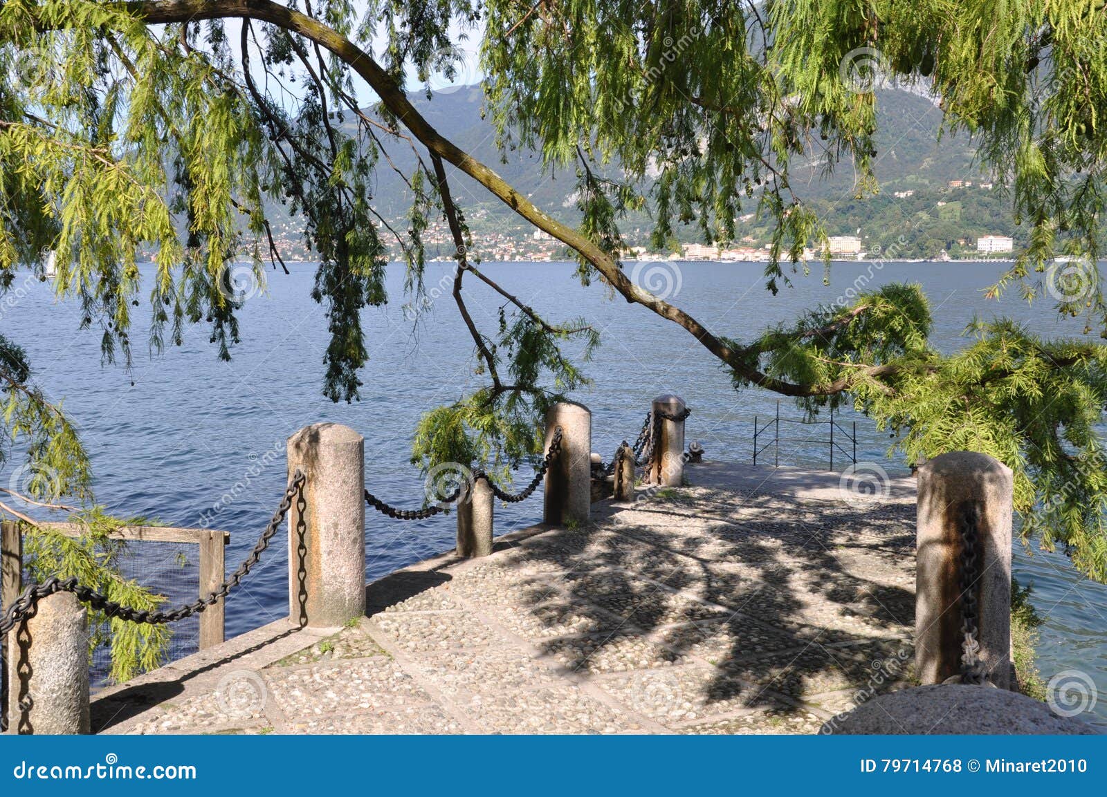 Stone jetty at Lake Como stock photo. Image of season - 79714768