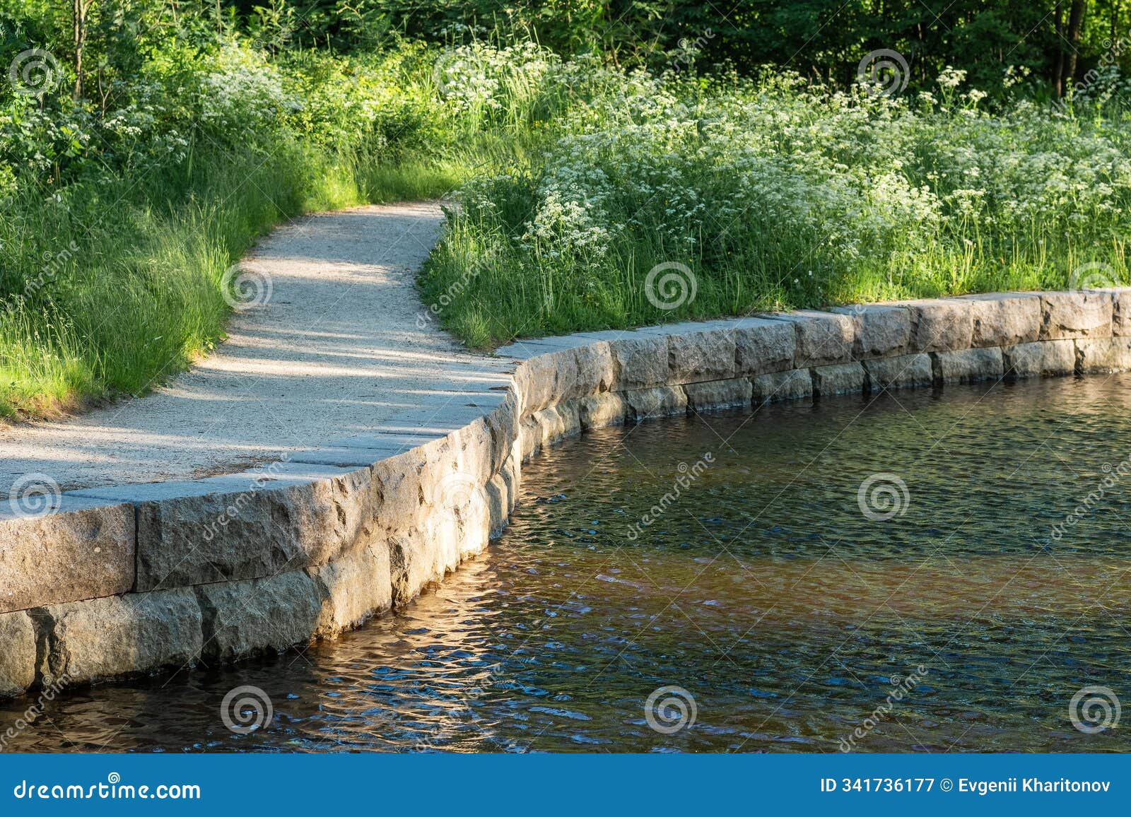 Stone-lined Stream Bank in a Park Stock Image - Image of design, shore ...