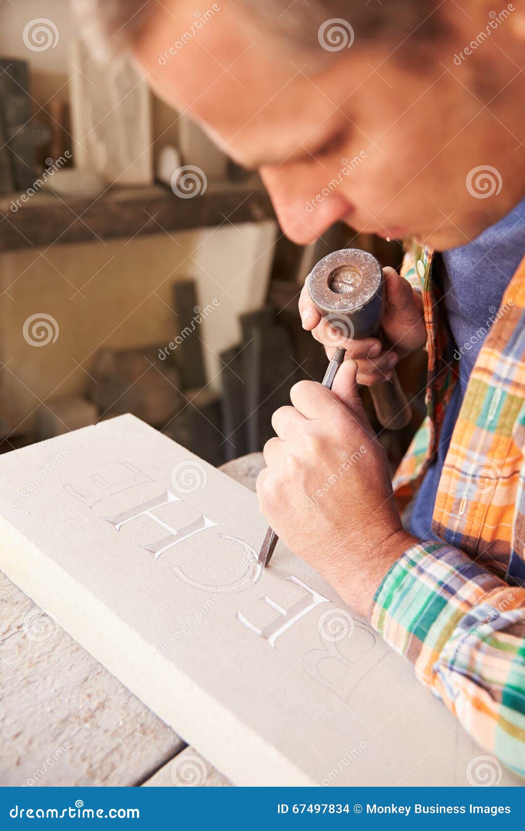 Stone Mason at Work on Carving in Studio Stock Photo - Image of craft ...