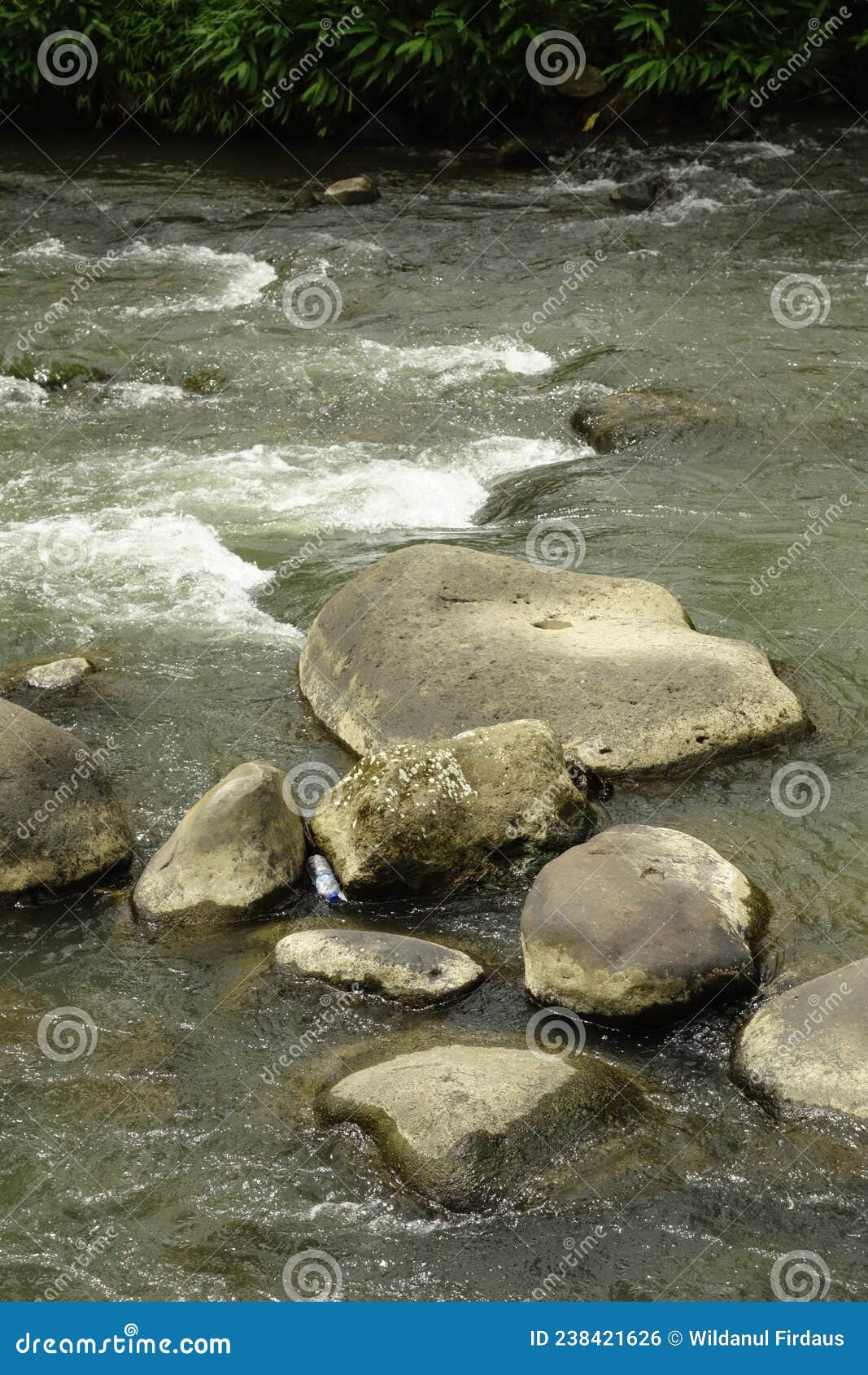Stone in the Middle of the River Flow Stock Photo - Image of water ...