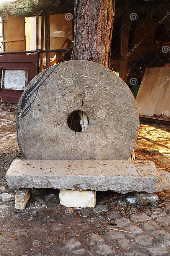 Stone mill wheel stock photo. Image of mill, village - 318073006