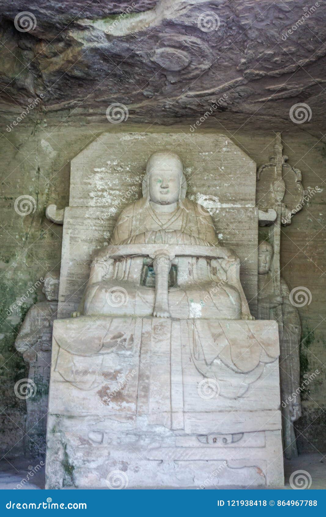 A stone monk in meditation stock photo. Image of stage - 121938418
