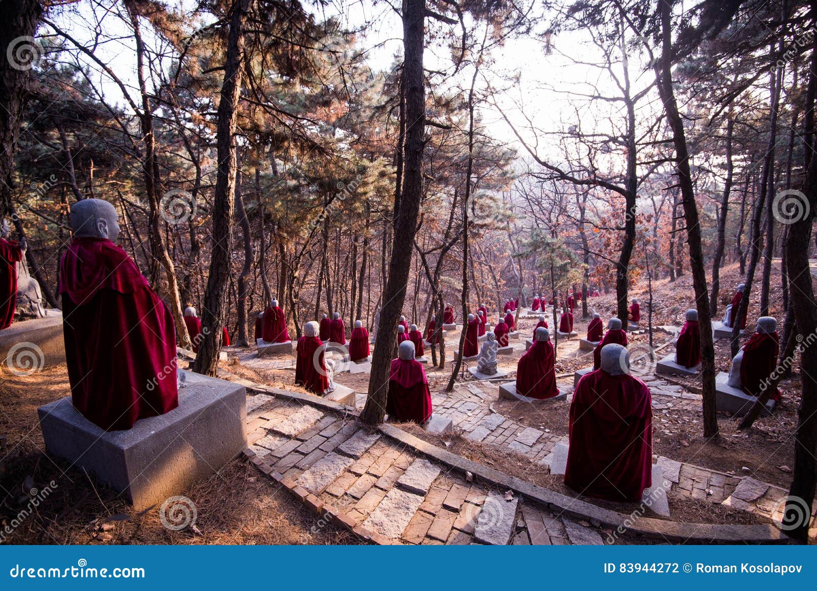 Stone Monk Statues Wearing Mantles at Chinese Forest Stock Photo ...