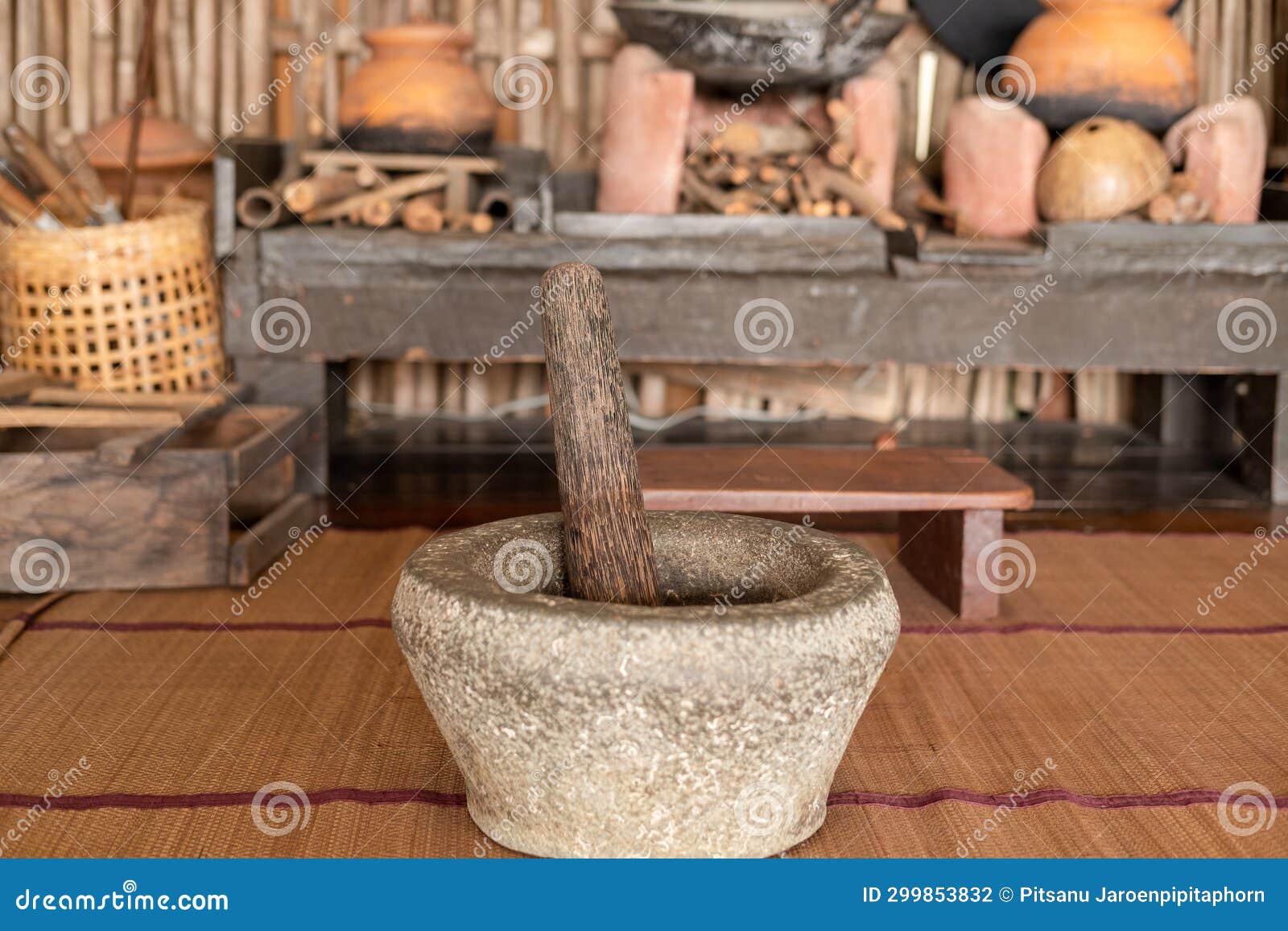 Stone Mortar and Pounding Stick in a Traditional Asian Kitchen Stock ...